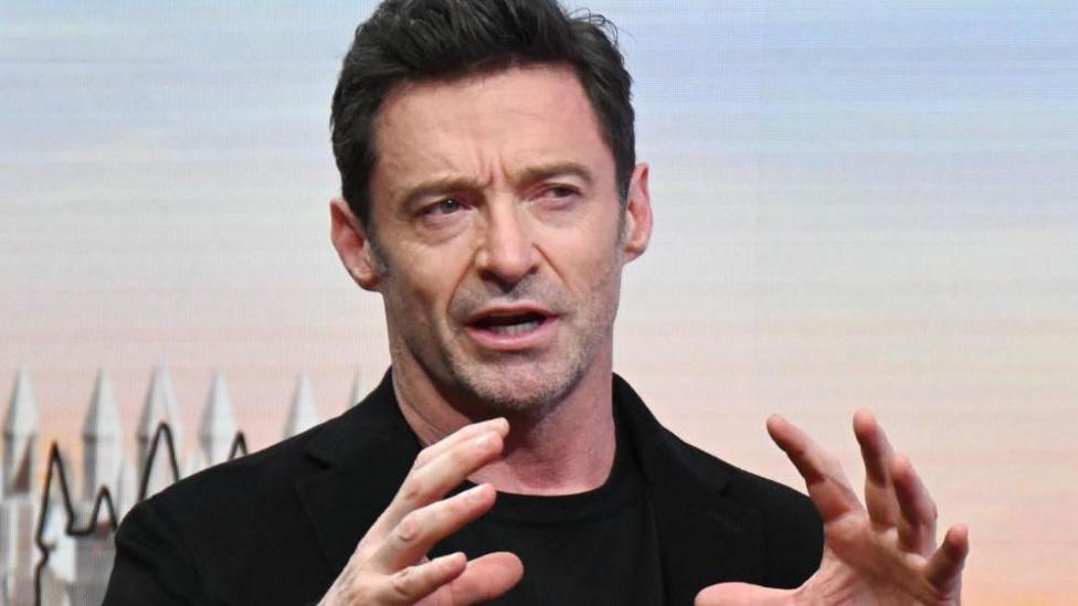 Hugh Jackman explains why he supports Norwich City Football Club - BBC News