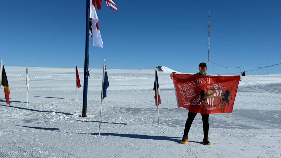 Brit wins men's seven marathons in seven continents challenge - BBC News