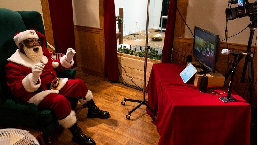 Plexiglass, sanitiser and masks: US mall Santas prepare for Christmas ...