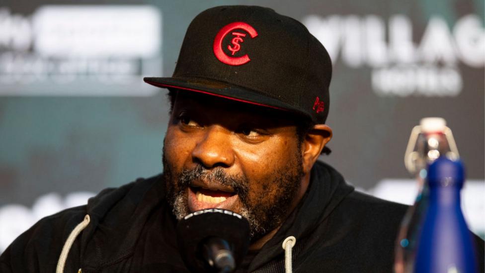 Brian McIntyre: Boxing trainer who brought gun to UK sentenced - BBC News