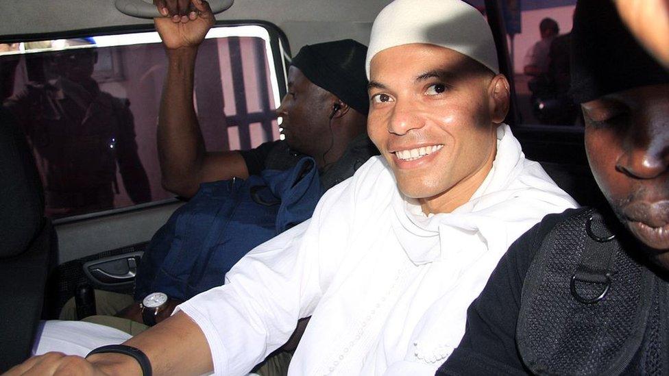 Senegal's Karim Wade freed by Macky Sall and 'flies to Qatar' - BBC News