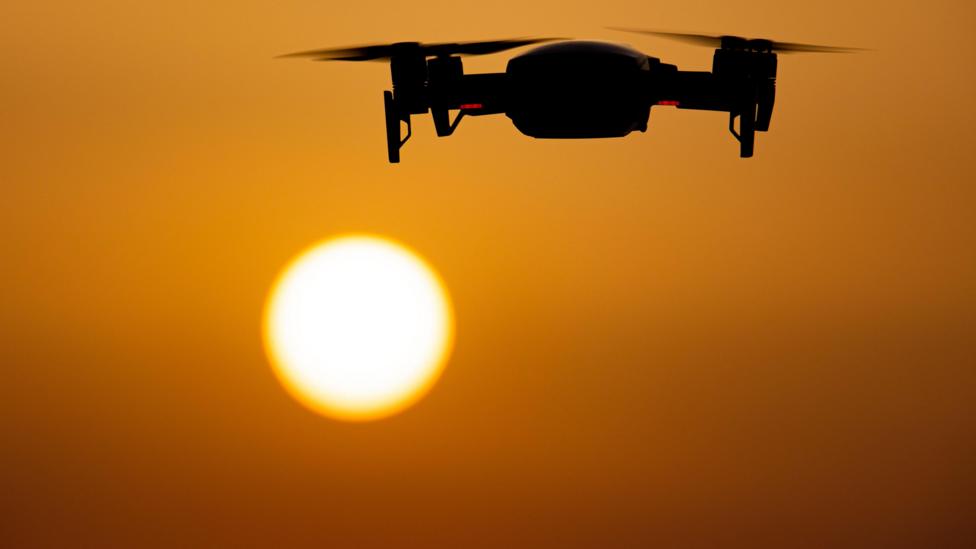 Police helicopter had 'near miss with drone' near Lakenheath - BBC News