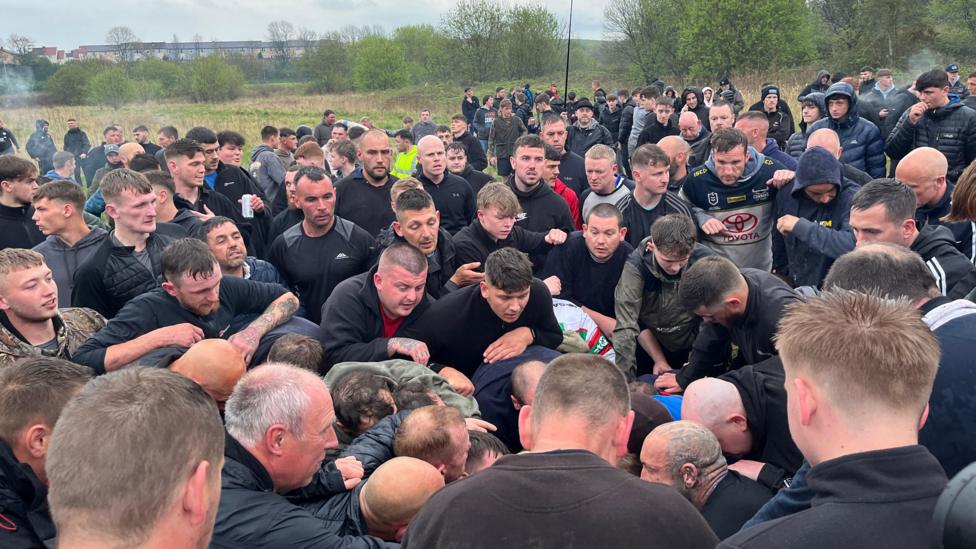 Workington's Uppies lead Downies in 'no rules' football series - BBC News