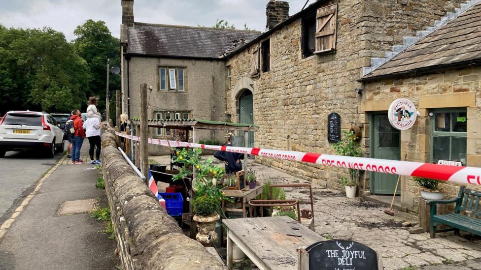 Blaze-hit Addingham cafe's owner aims to rebuild business - BBC News