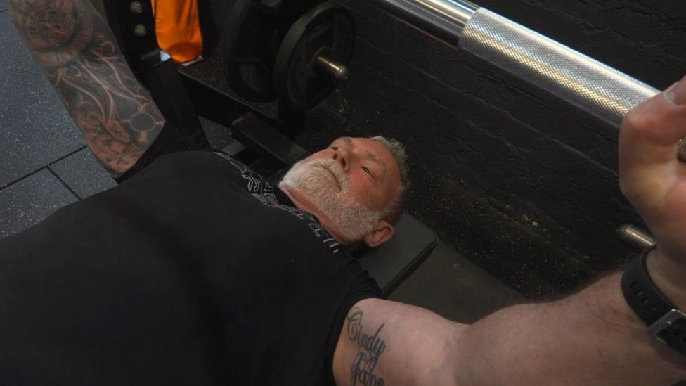 New world record-holder powerlifter says 'age is no barrier' - BBC News