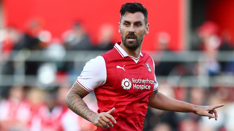 Grant Hall and Dylan Mitchell: Swindon Town sign defender and ...