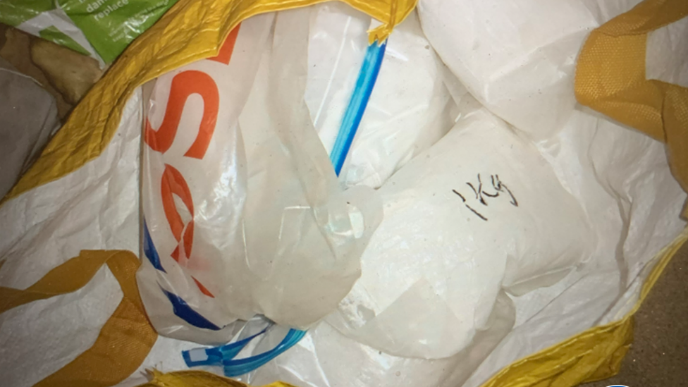 Guns drugs and cash seized in Coventry police raids - BBC News