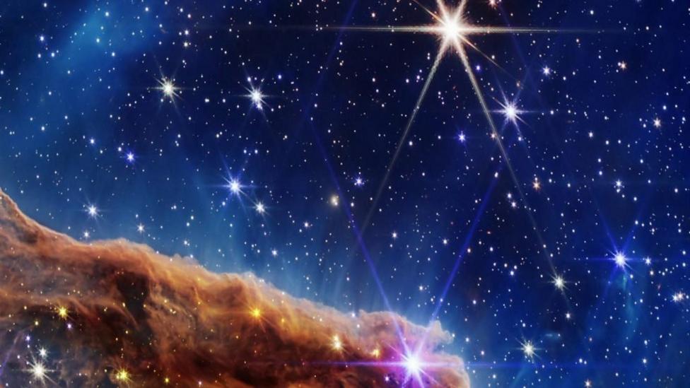 Euclid: Telescope captures image of rare Einstein ring in space - BBC Newsround