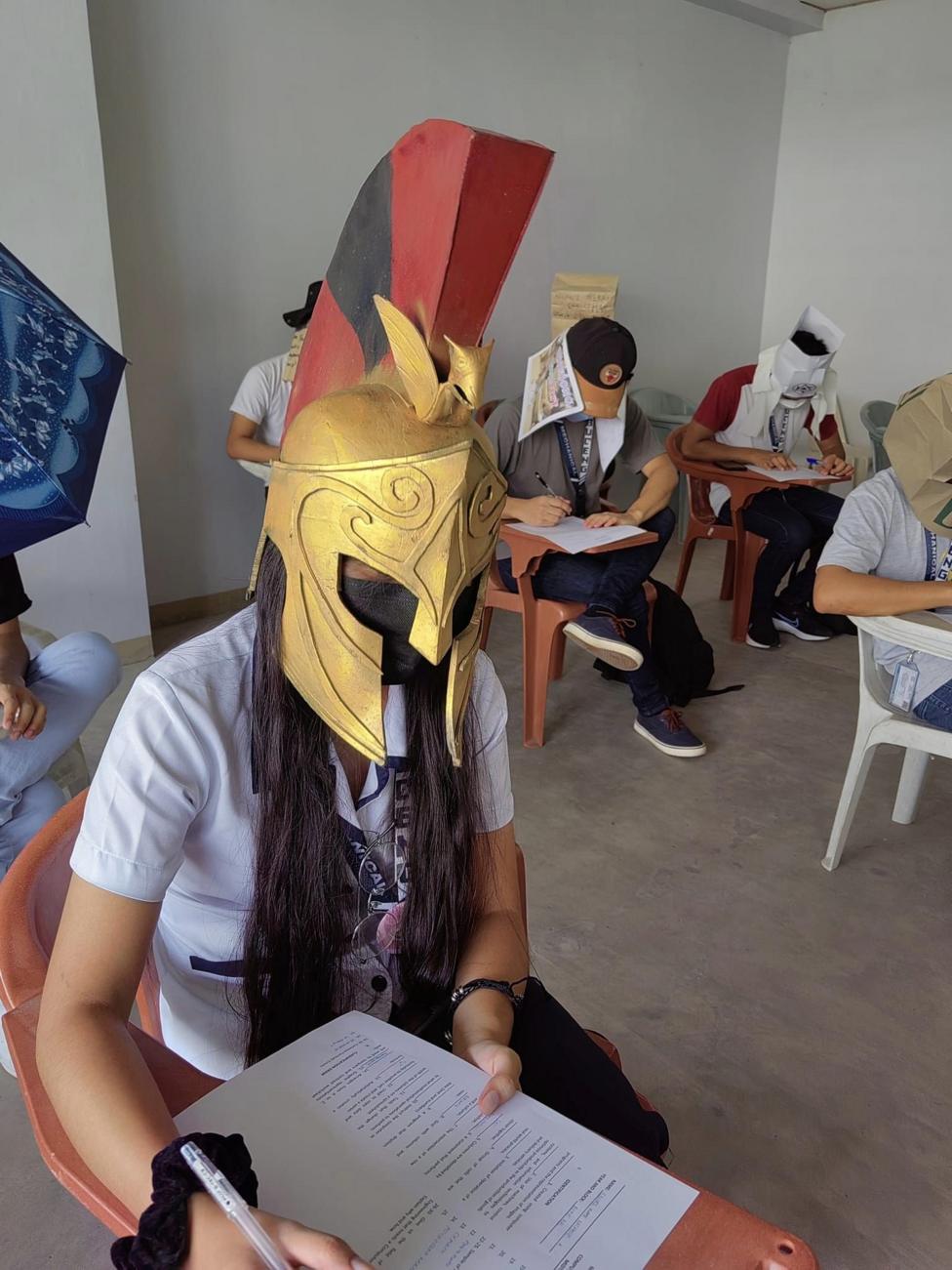 Students wear homemade 'anti-cheating' hats during exam - BBC Newsround