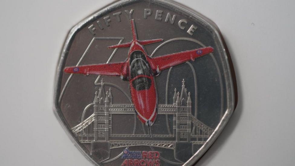 Ipswich artist's Red Arrows coins approved by King - BBC News