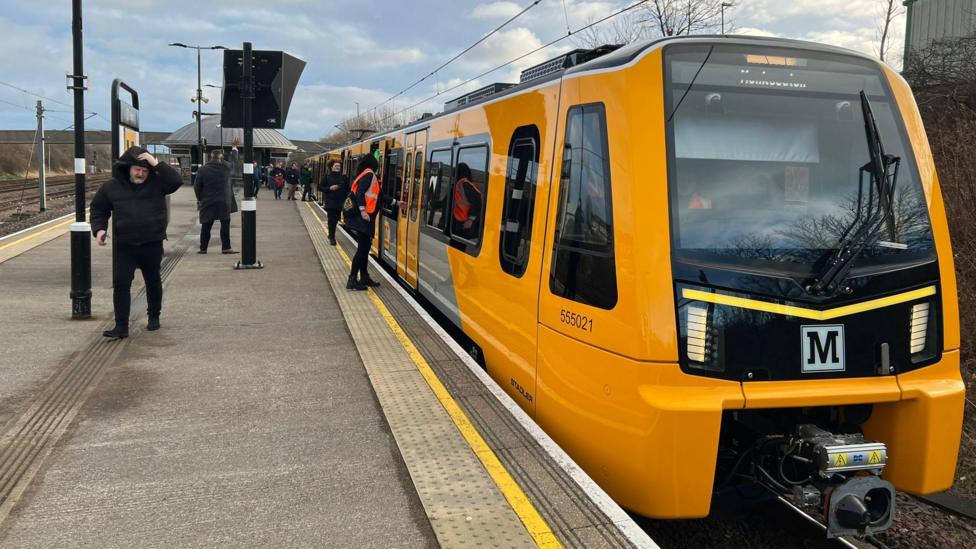 New Metro trains taken out of service over 'door fault' - BBC News