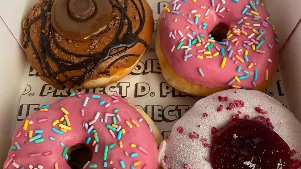 Project D: Doughnut firm strikes deal to avoid going bust - BBC News