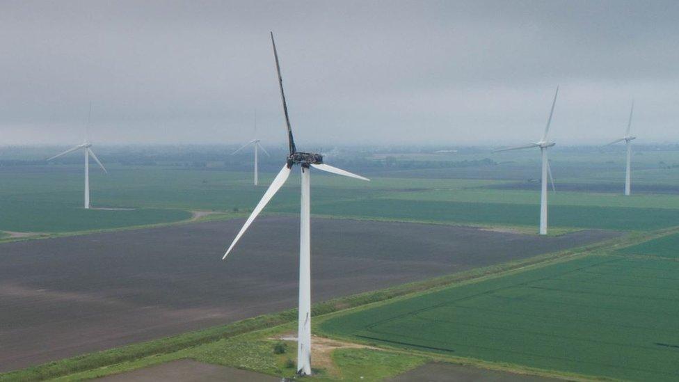 Doddington wind turbine fire follows storms - BBC News