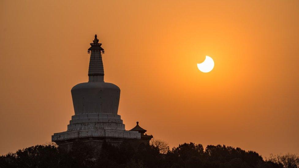 The first partial solar eclipse of 2019 dazzled skies in Eastern Asia ...