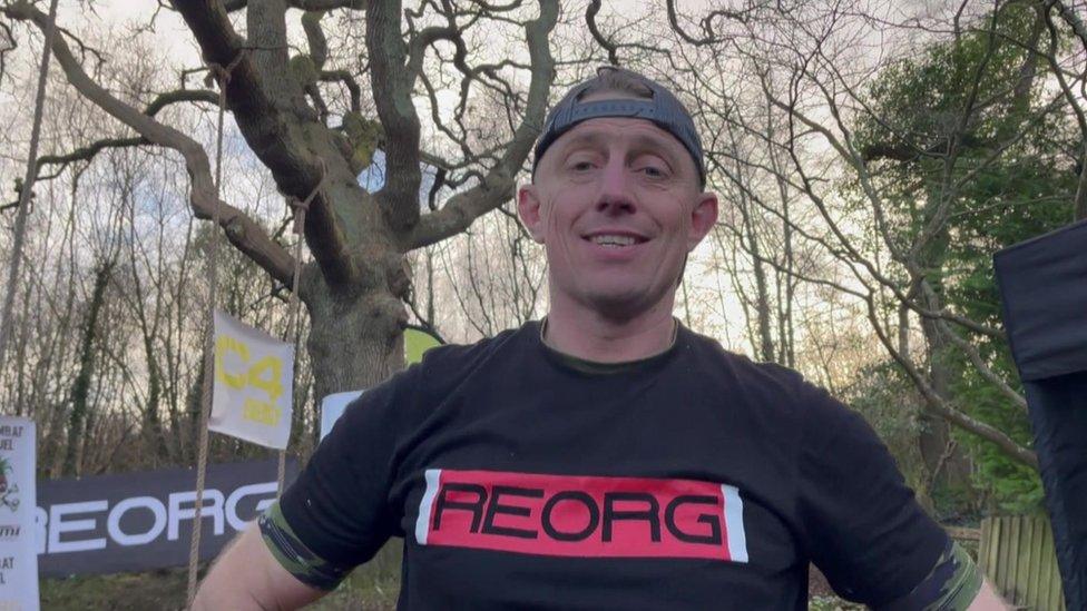 Former commando completes 24-hour charity rope climb - BBC News