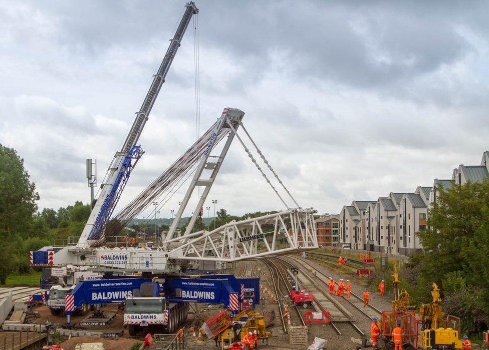 Oxford to Didcot Parkway rail tracks raised to reduce flooding - BBC News