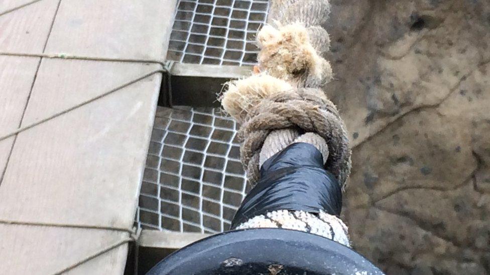 Carrick-a-Rede rope bridge reopens following vandalism - BBC News