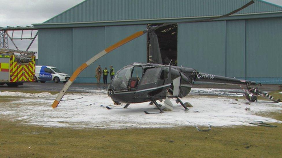 Helicopter accident at Perth Airport - BBC News