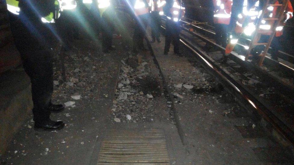 Masonry found on Tube train roof after tunnel roof damaged - BBC News