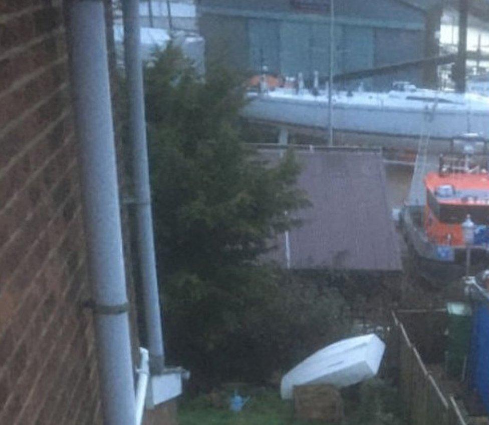 Man injured as East Cowes 'tornado' hurls stones through roof - BBC News