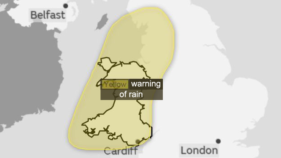Yellow flood warning as torrential downpours hit Wales - BBC News