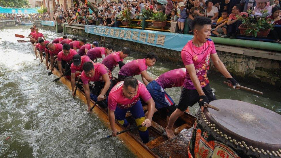 China's Dragon Boat Festival celebrations in pictures - BBC Newsround