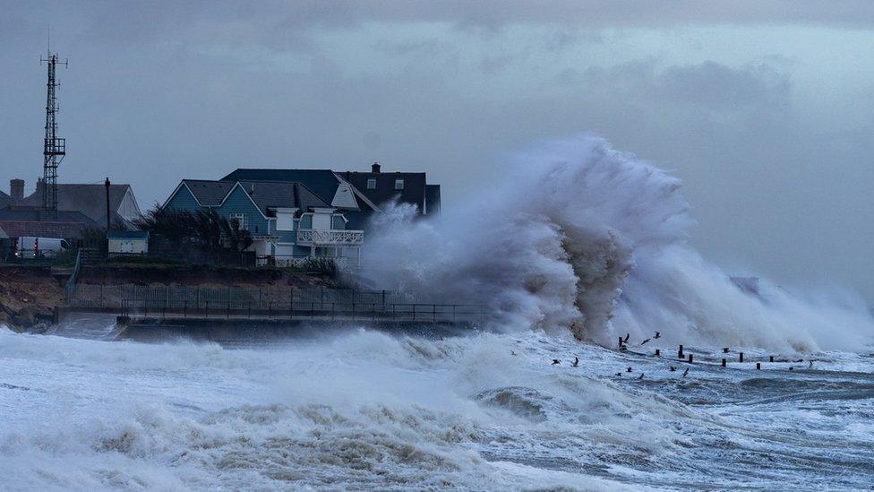 Storm Henk brings 94mph gusts and travel chaos - BBC News