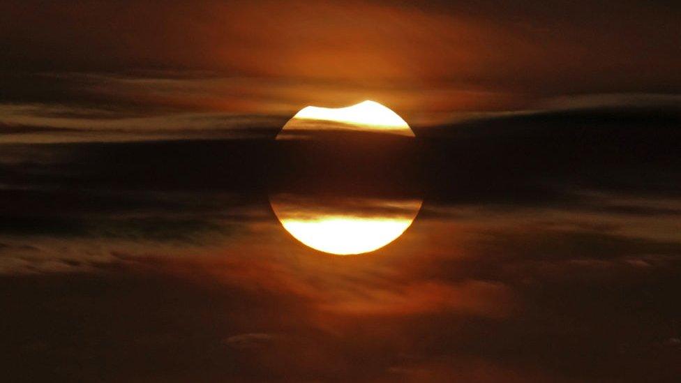 The first partial solar eclipse of 2019 dazzled skies in Eastern Asia ...