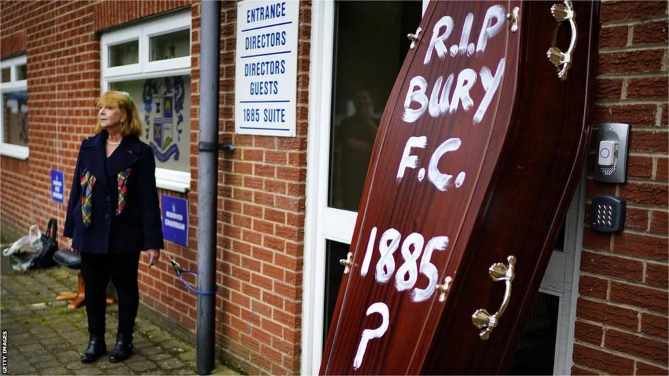 Bury fans prepare Gigg Lane for use after four years away - BBC Sport