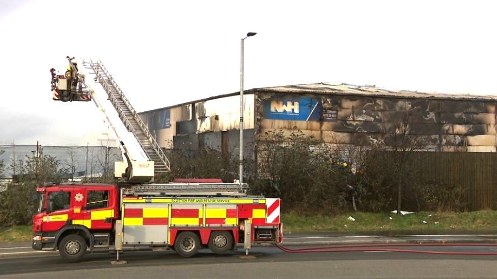 Crews tackle fire at recycling centre in Glasgow - BBC News
