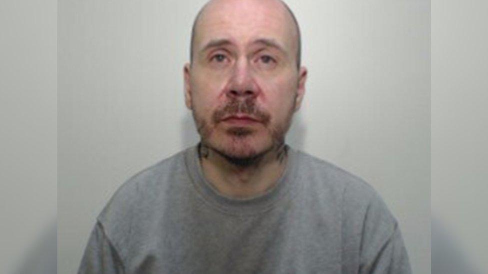 Oldham killer who daubed victim's body in nail varnish is jailed - BBC News