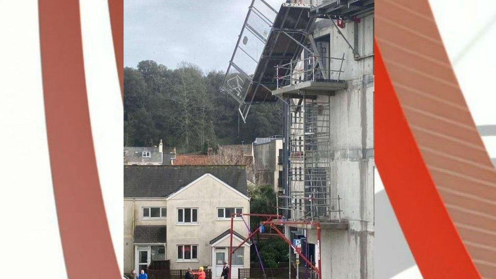 Man in 'unknown condition' after falling from height at building site ...