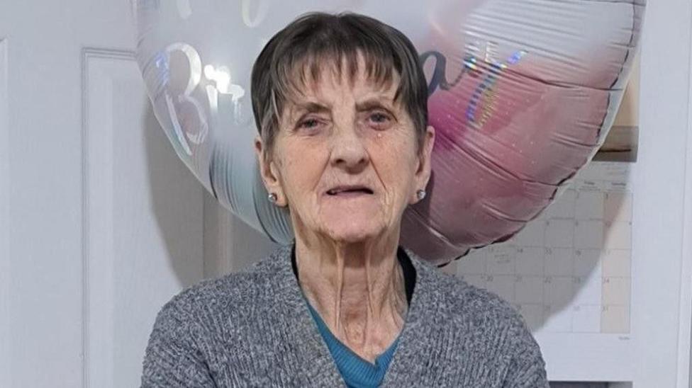 Police hunt for 'dangerous' grandson of woman murdered in street - BBC News