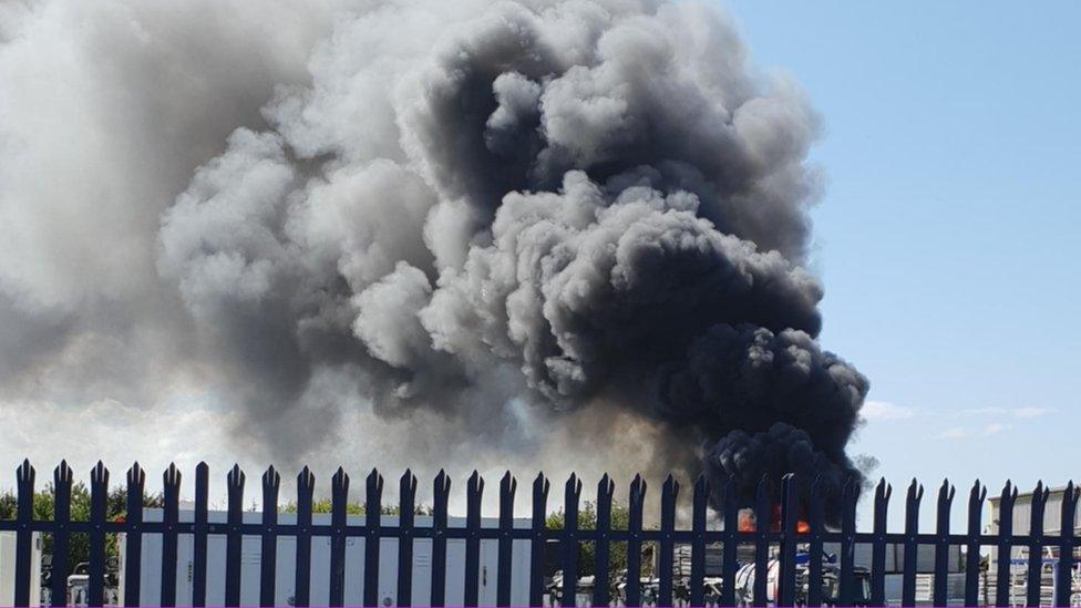 Fire crews tackle industrial estate blaze in Elgin - BBC News