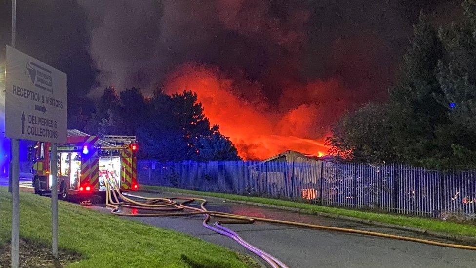 Blackburn fire: Firefighters tackle blaze on industrial estate - BBC News