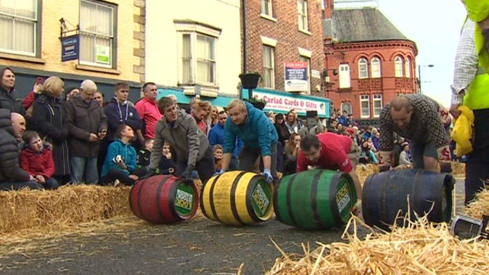 Rolling out the barrel for 60 years in Denbigh - BBC News