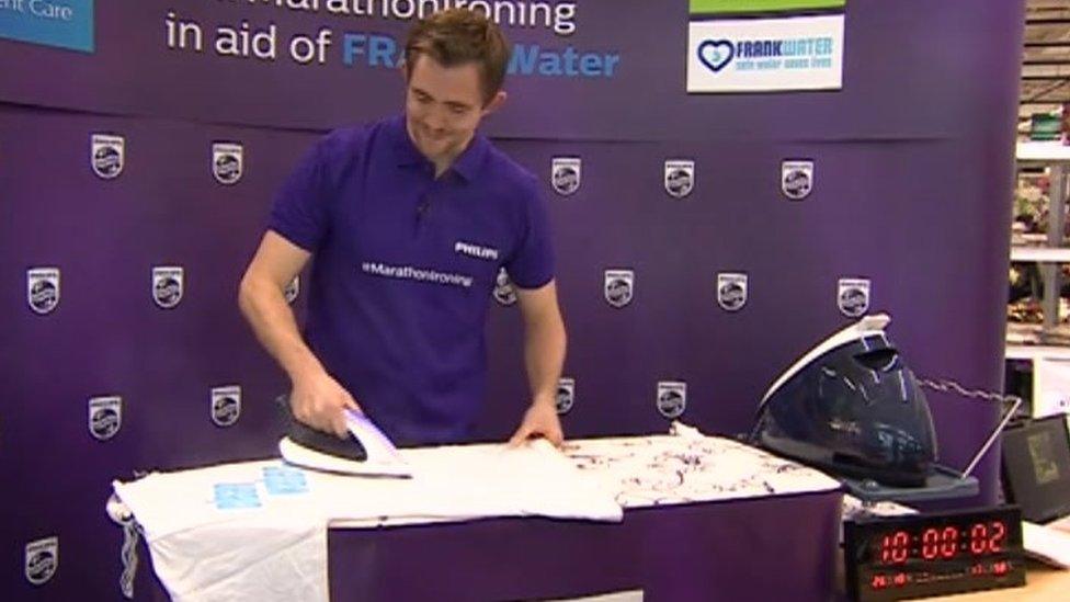 Ironing man Gareth Sanders begins 100-hour record bid - BBC News