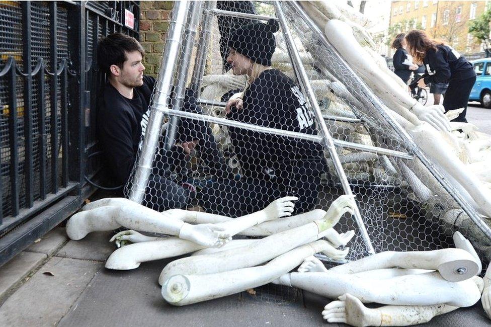 Hundreds of fake limbs dumped outside Russian embassy - BBC News