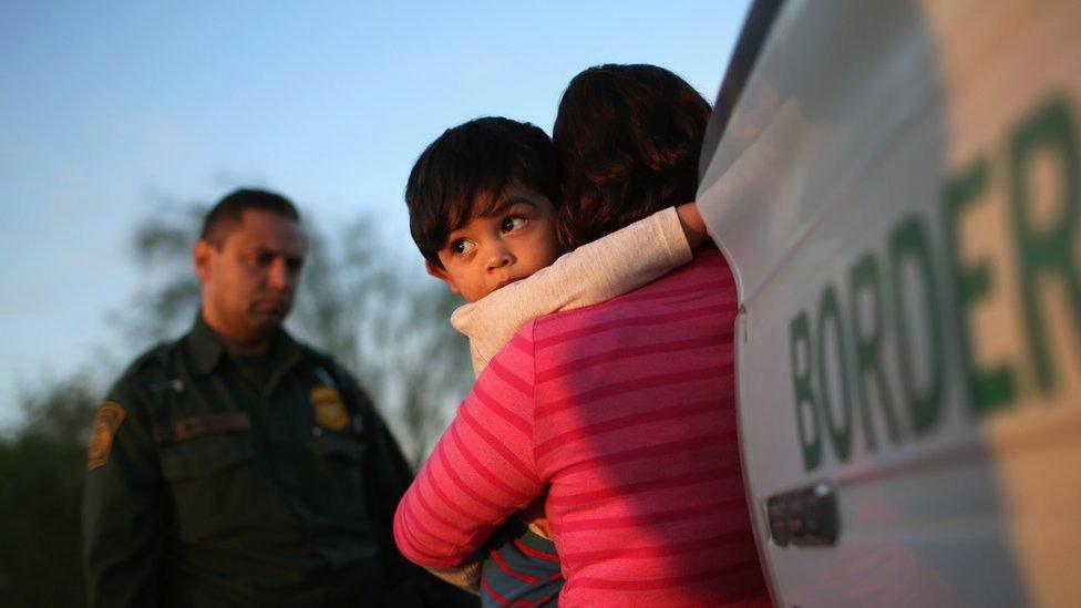 Hillary Clinton calls for end to 'divisive' deportation raids - BBC News