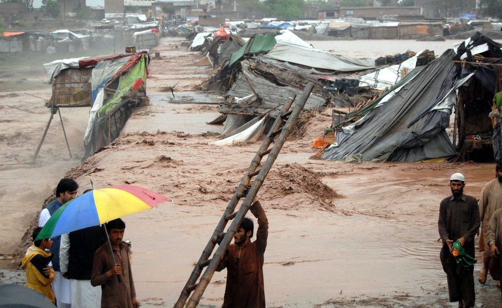 Pakistan floods kill at least 53 after heavy rains - BBC News
