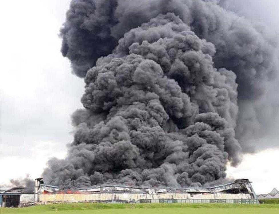 Sywell Aerodrome fire: Crews leave site of warehouse blaze - BBC News