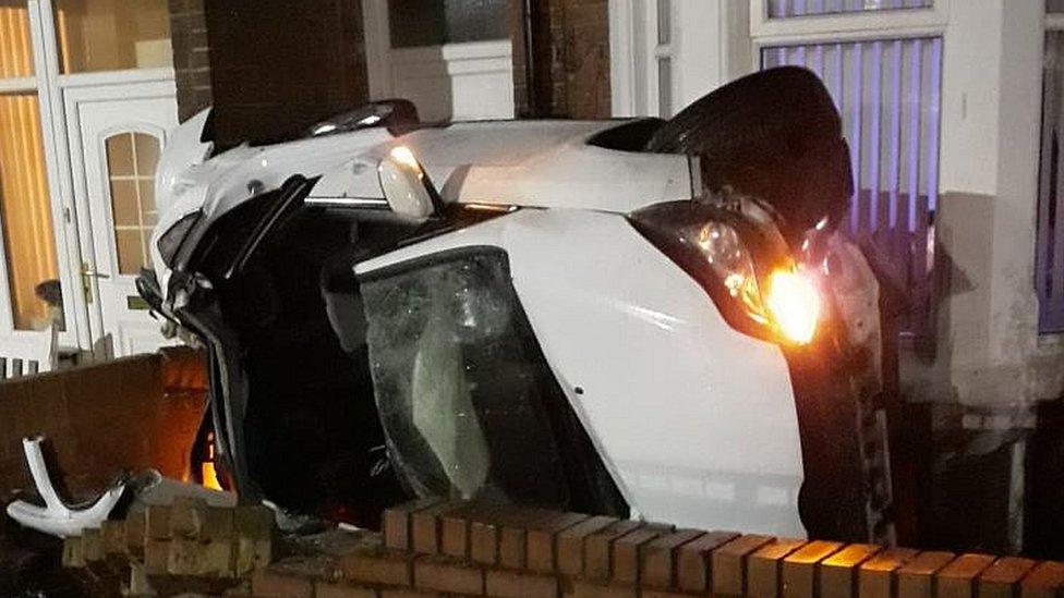 Ashington crash: Boy, three, hurt as car lands in front of house - BBC News