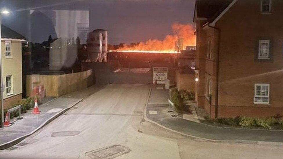 Bootle fire: Firefighters tackle large blaze on field - BBC News
