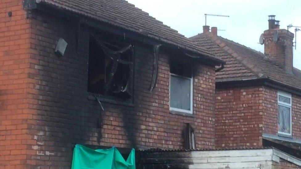Two dead and five hurt in Manchester house fire - BBC News