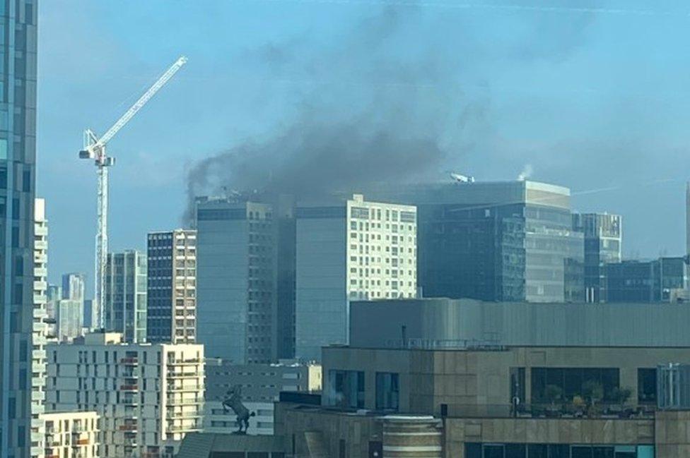 Aldgate fire: Large blaze at high-rise London tower block - BBC News