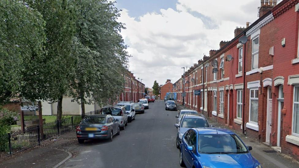 Rusholme murder probe after man found dead at house - BBC News
