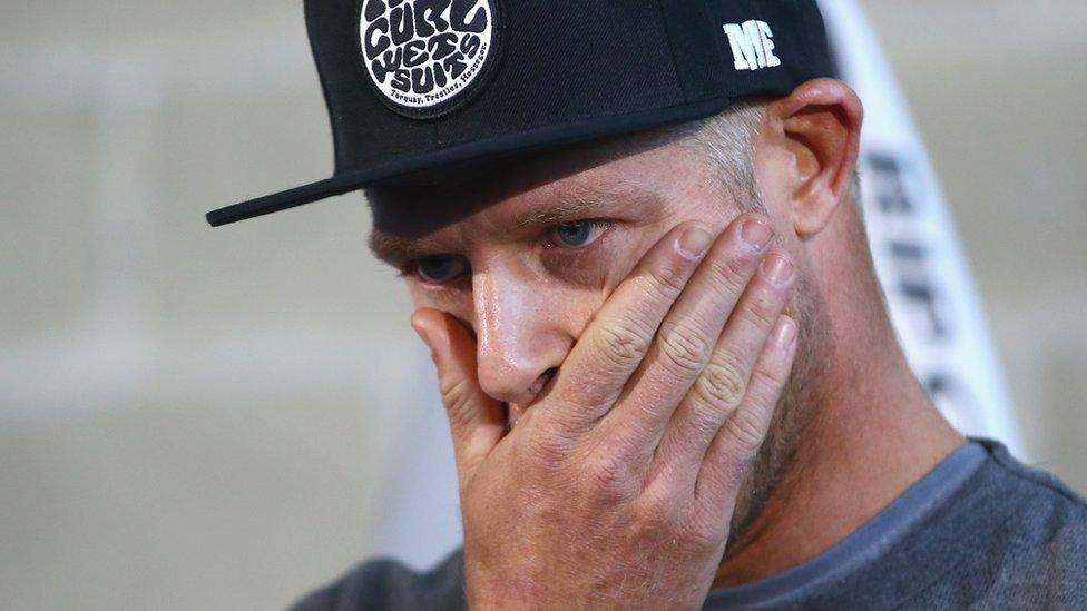 Fanning wins world surf title heat despite brother's death - BBC News