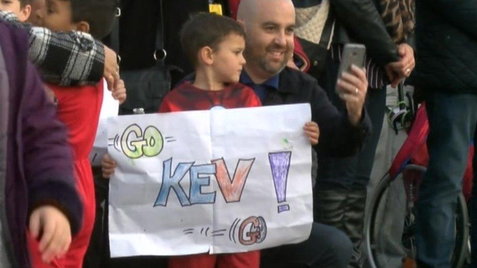 River Severn record swimmer, Kevin Brady, arrives in home city - BBC News