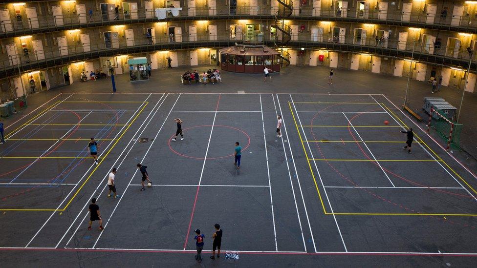 In pictures: The Dutch prison asylum seekers call home - BBC News