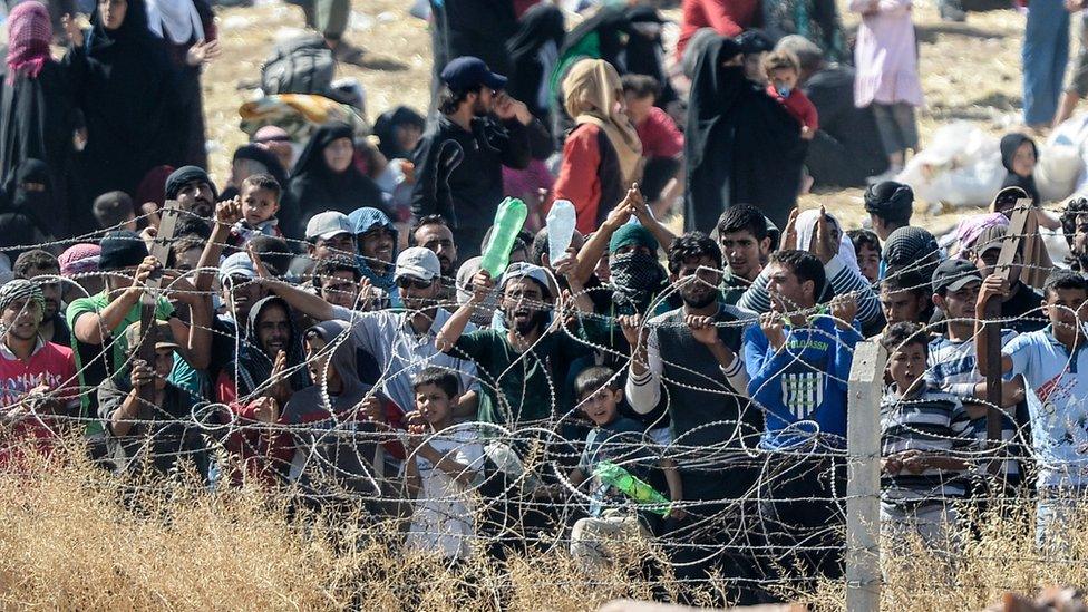 Syrian refugees' move to US was 'the happiest day' - BBC News